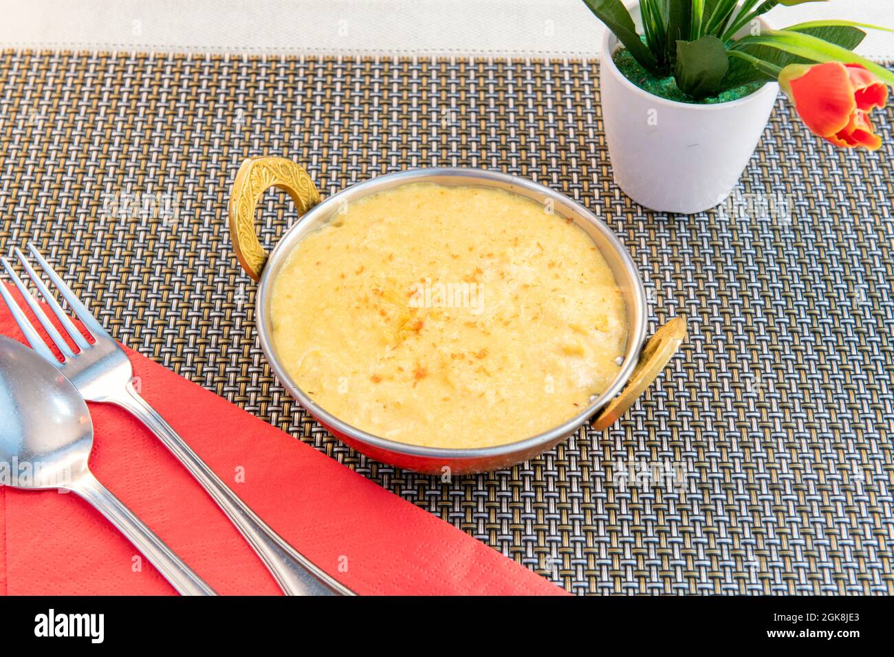 Chicken korma mild curry with lots of coconut served in a traditional ...