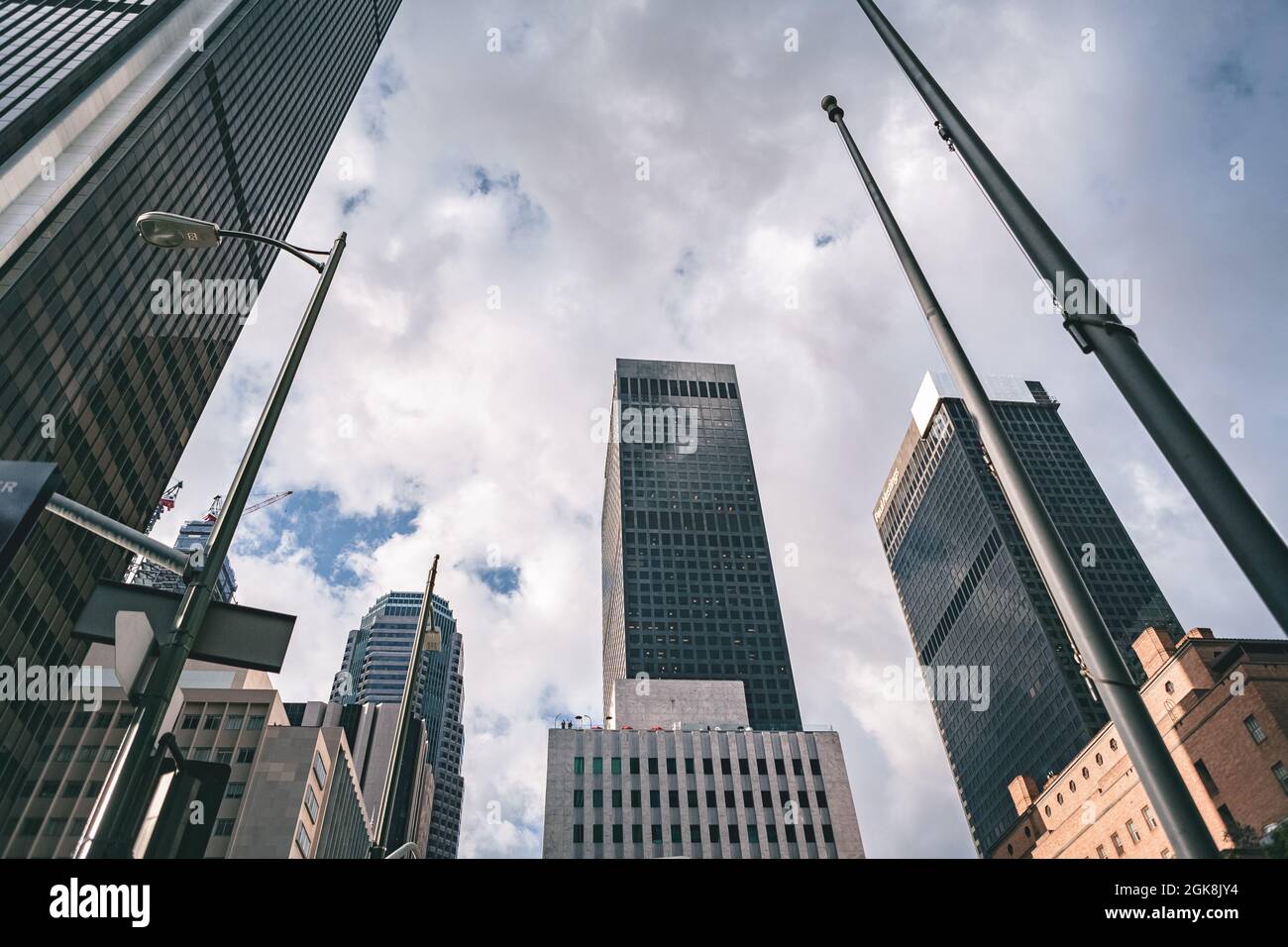 High rise buildings and poles Stock Photo - Alamy
