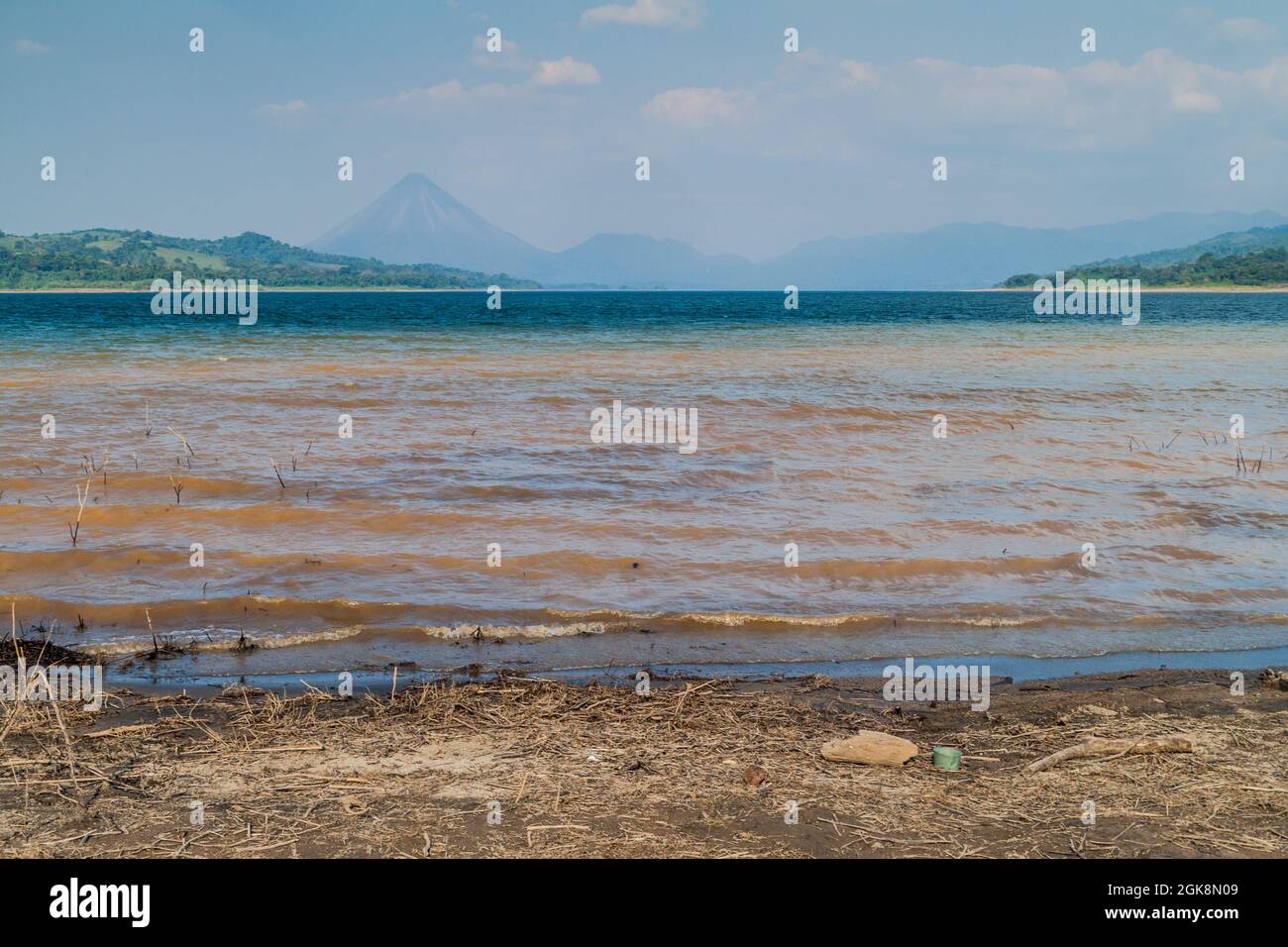 Laguna de Arenal reservoir, Costa Rica. Arenal volcano in the ...