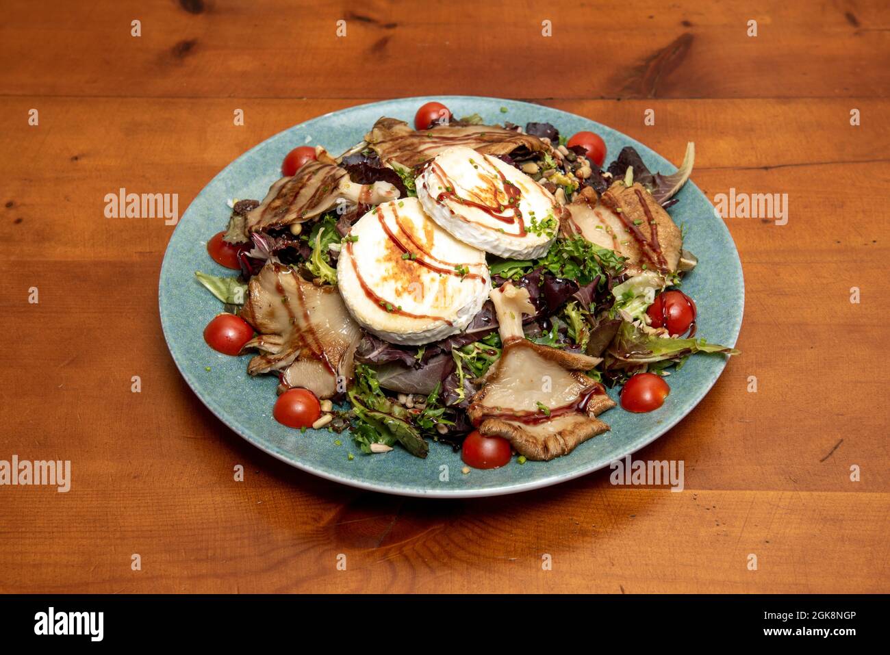 Goat cheese salad, thistle mushrooms, cherry tomatoes, seeds, oak ...