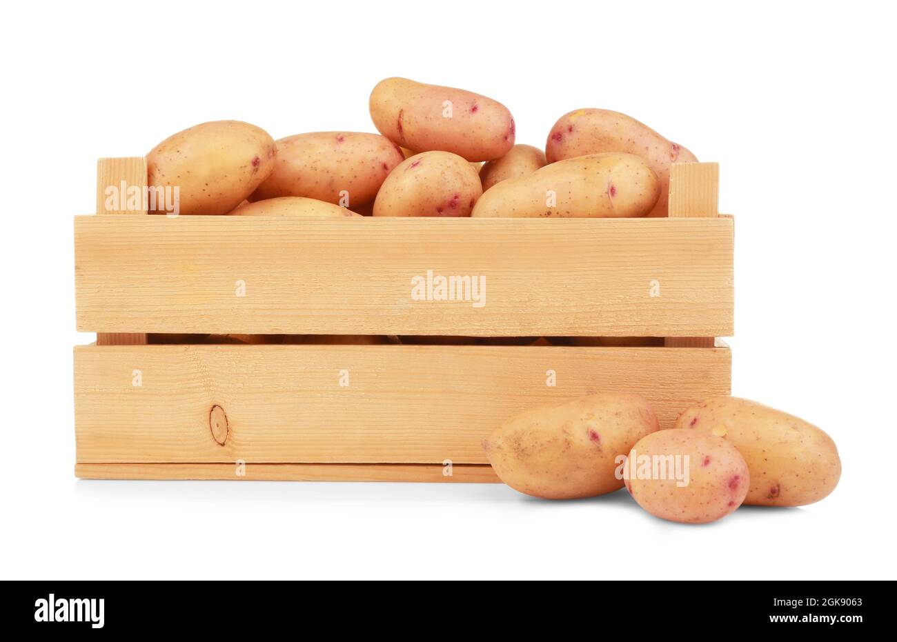 Wooden box with potatoes on white background Stock Photo - Alamy