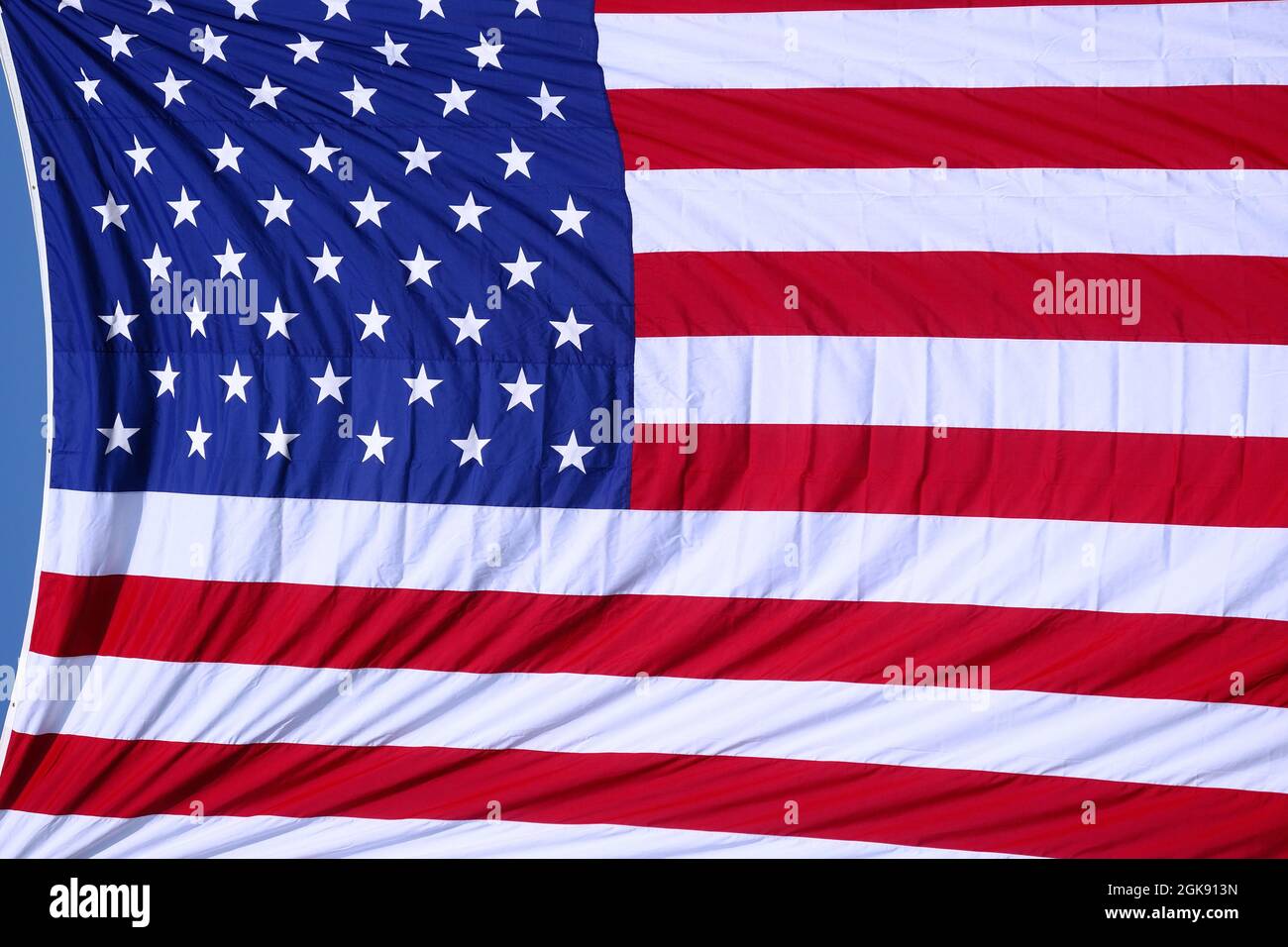 Large American Flag Hanging Stock Photo - Alamy