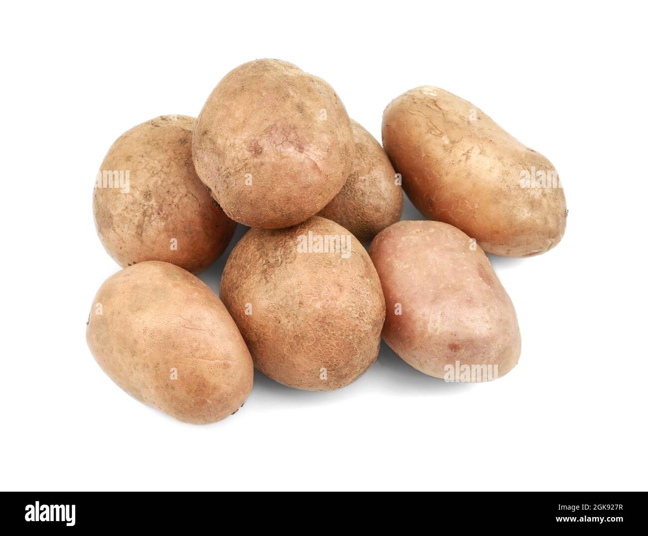 Raw unpeeled potatoes on white background Stock Photo - Alamy