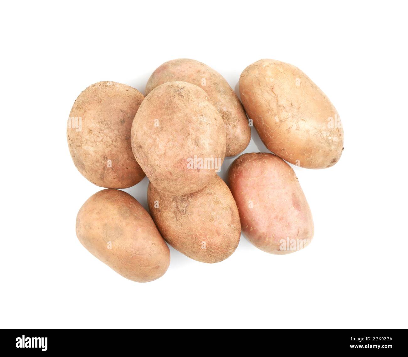 Raw unpeeled potatoes on white background Stock Photo - Alamy