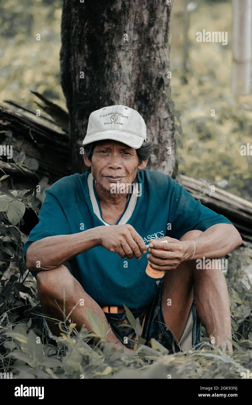 Taking rest under tree hi-res stock photography and images - Alamy