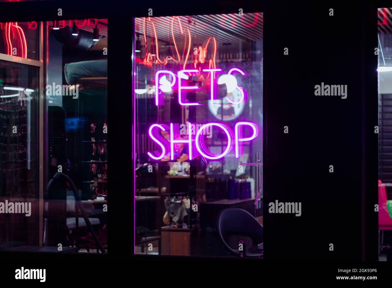pet shop store grooming salon neon sign window Stock Photo - Alamy