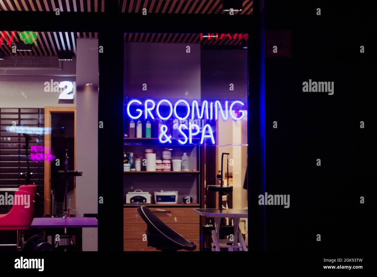 grooming spa for pets salon neon sign window Stock Photo - Alamy