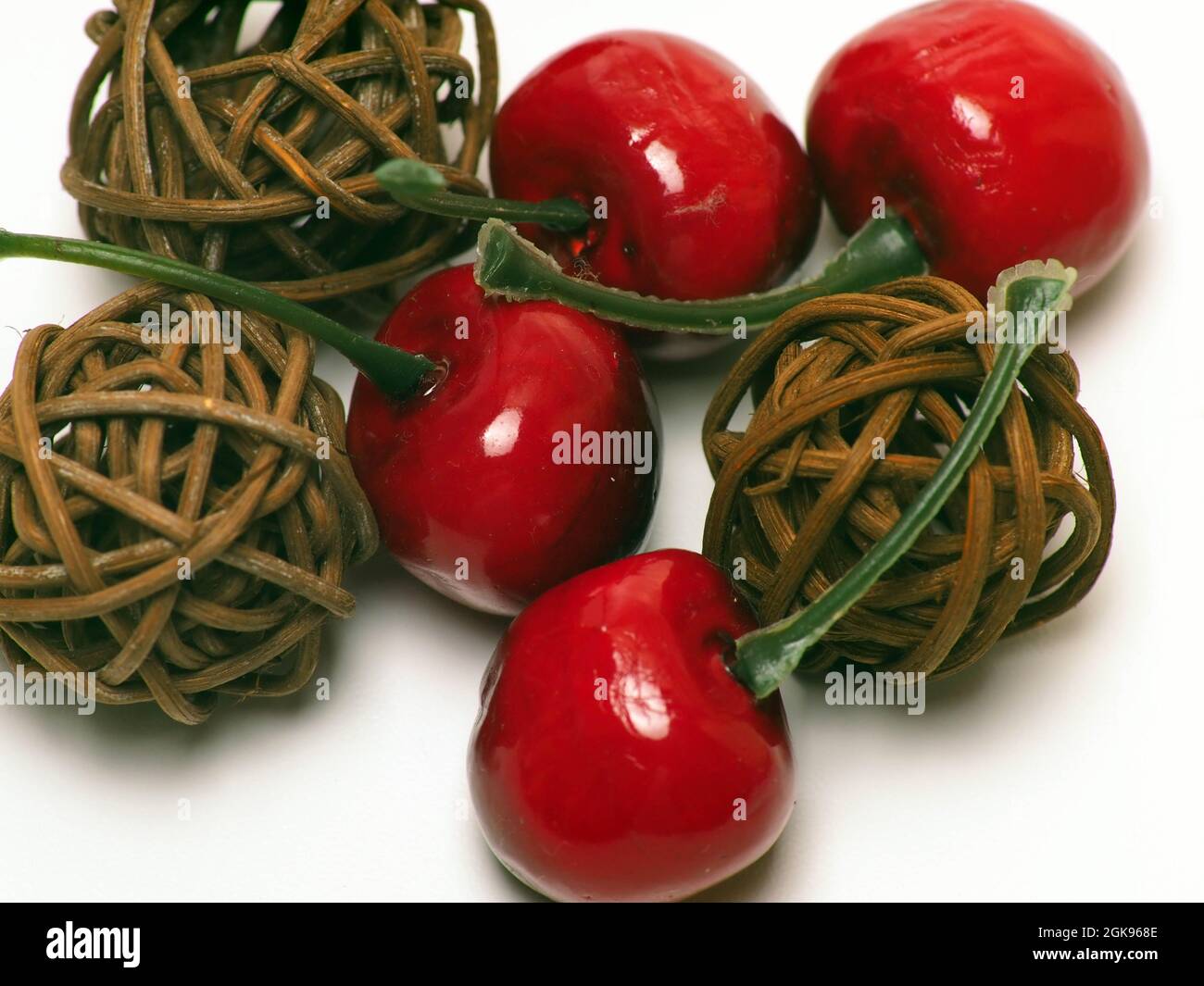 close up shoot of fruits and rattan balls. Shoot on a white isolated ...