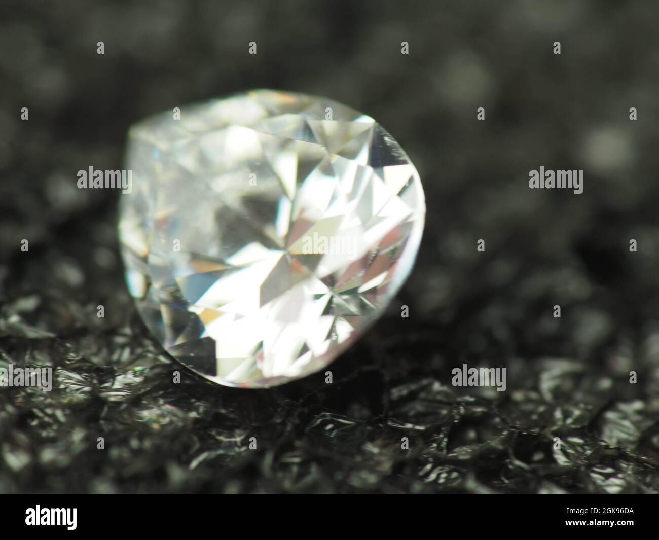Close up shoot of pear shape diamond. Capture on black background Stock ...