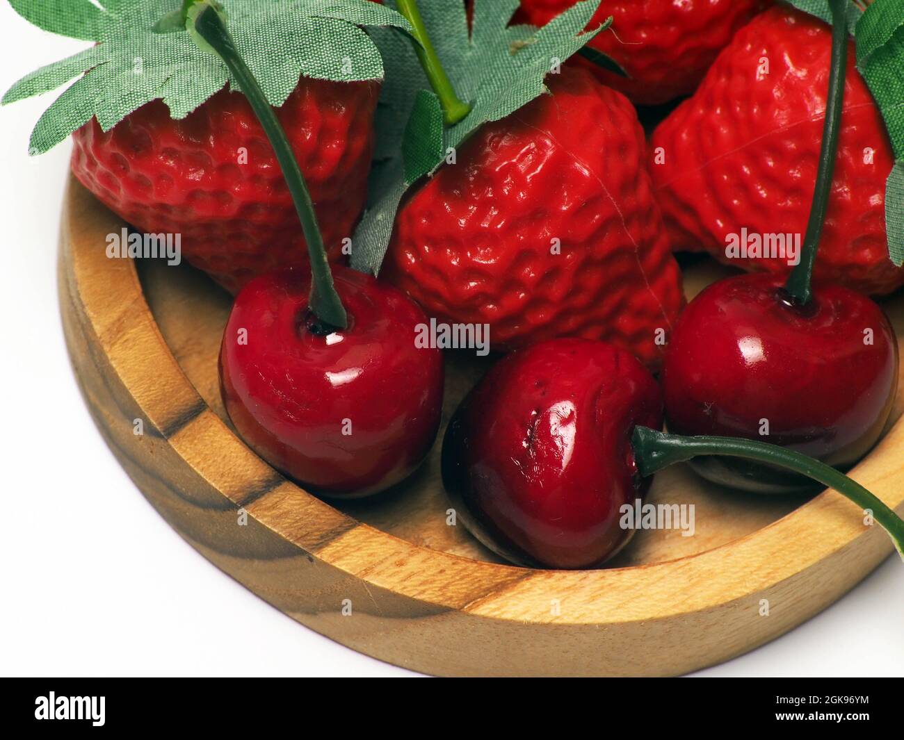 close up shoot of fruits and rattan balls. Shoot on a white isolated ...