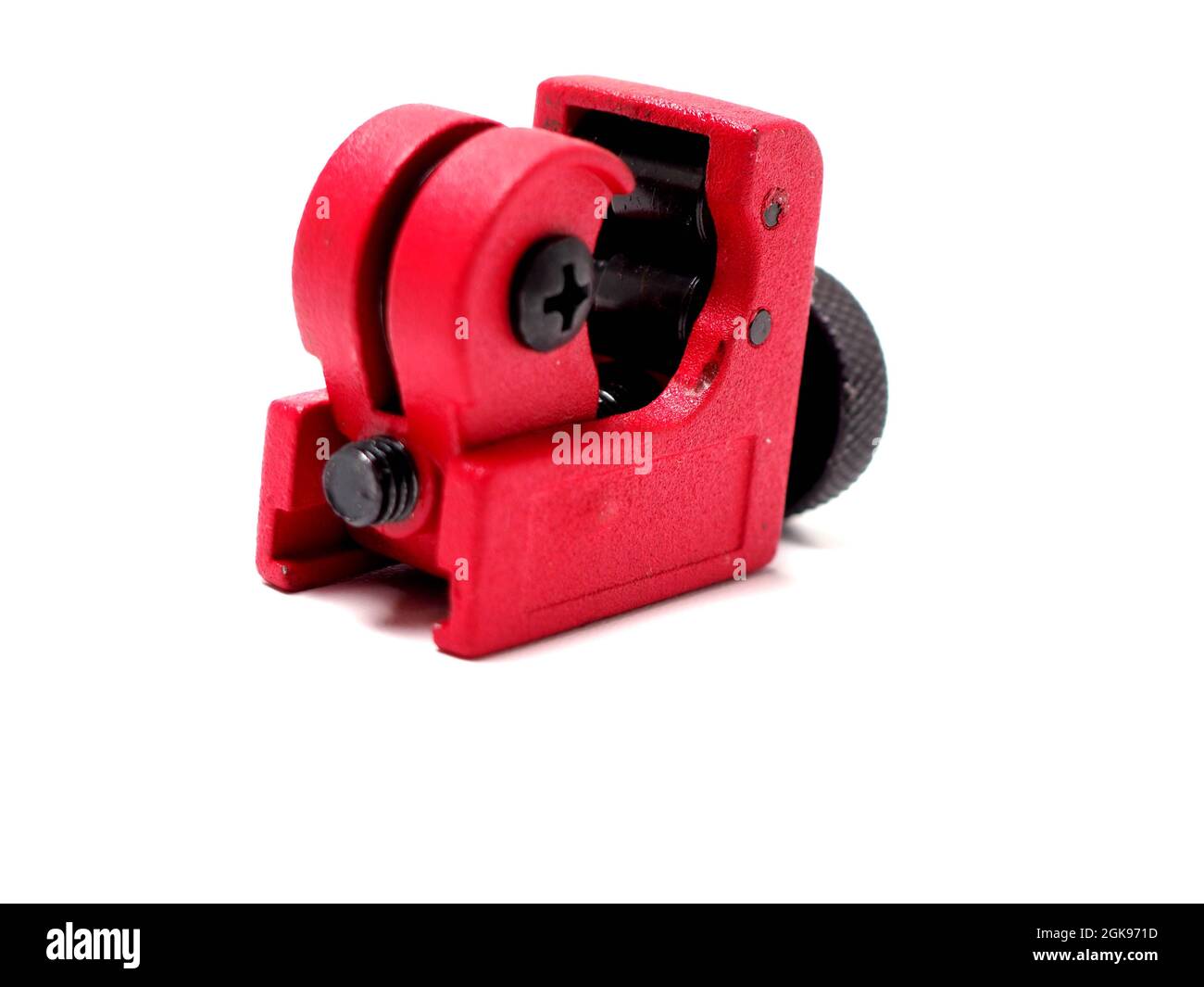 Picture of red mini pipe cutter that usually used by technician to cut ...