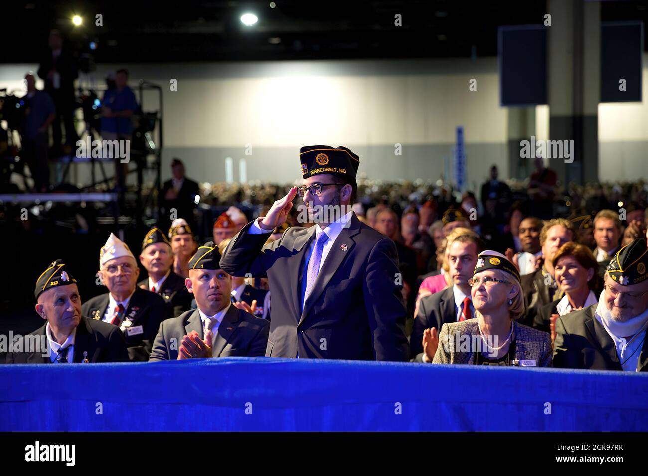 Sgt. Joe Grassi salutes after being recognized by President Barack ...