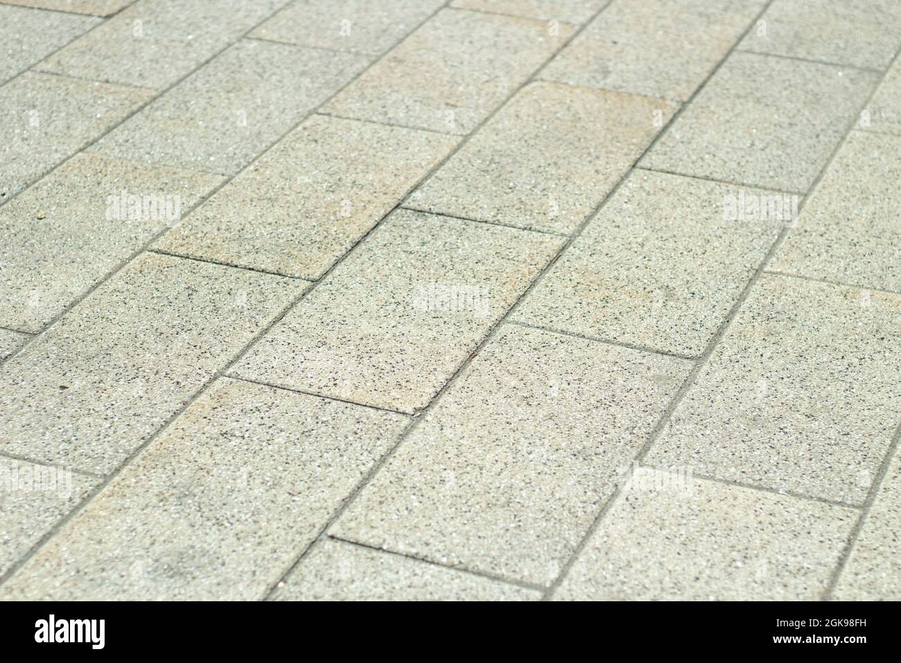 Tiles in the pedestrian zone. The texture of the road surface for ...