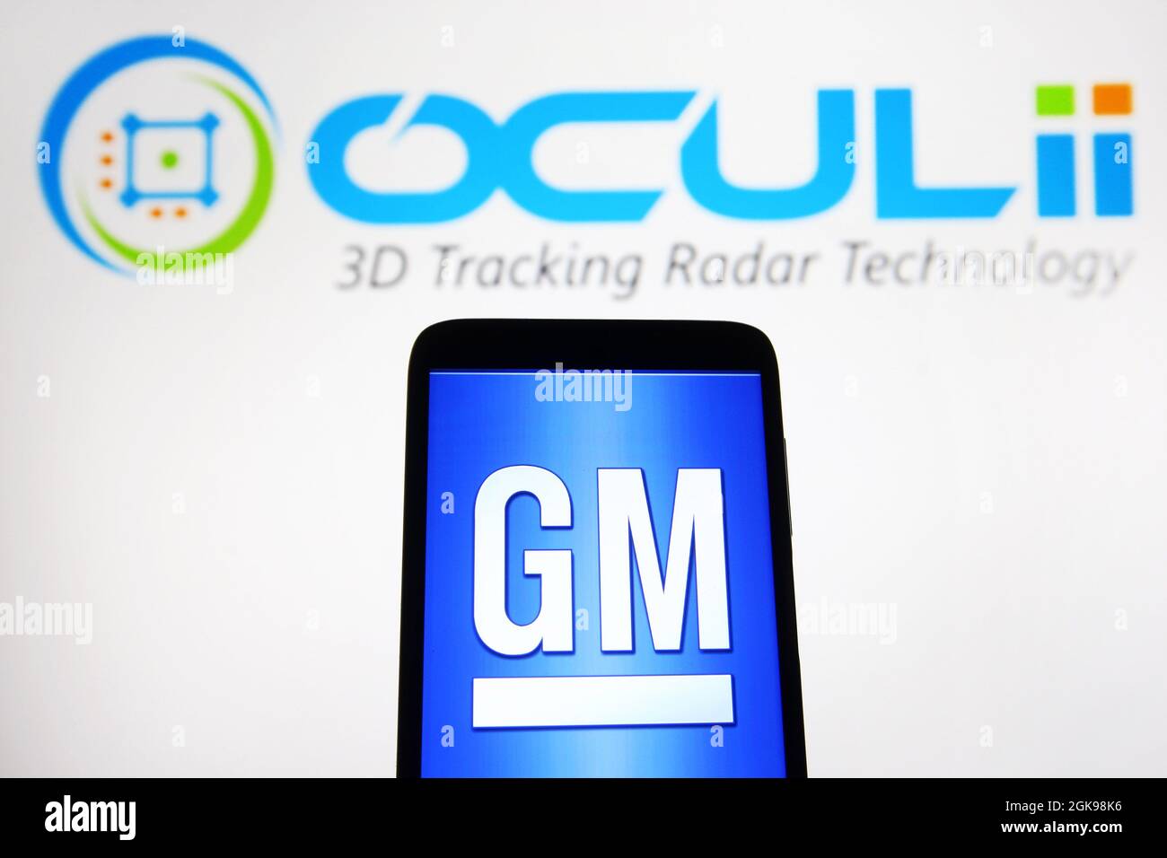 In this photo illustration a General Motors Company (GM) logo is seen ...