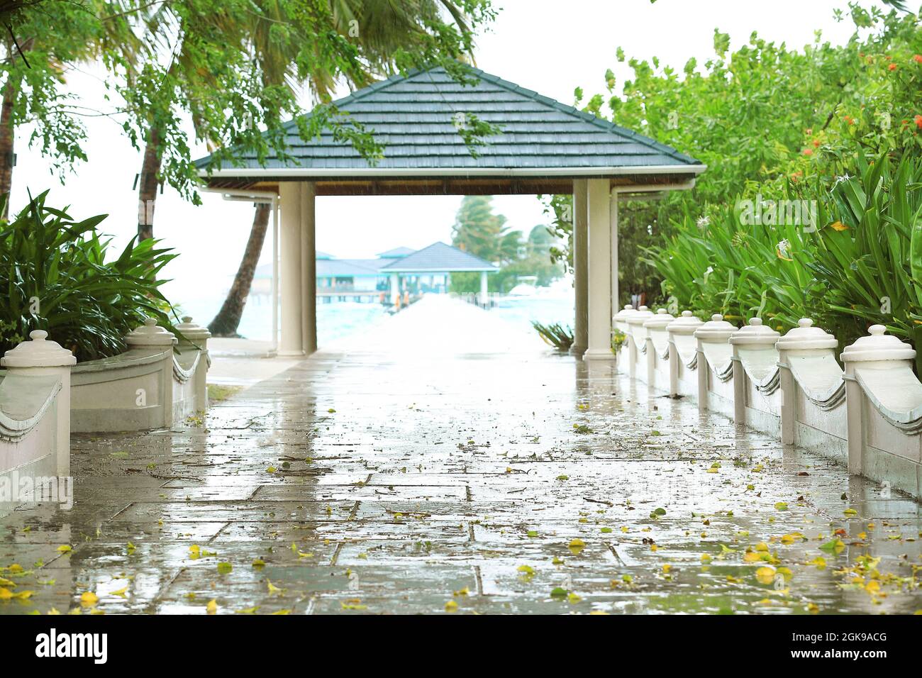 View of tropical resort on rainy day Stock Photo - Alamy