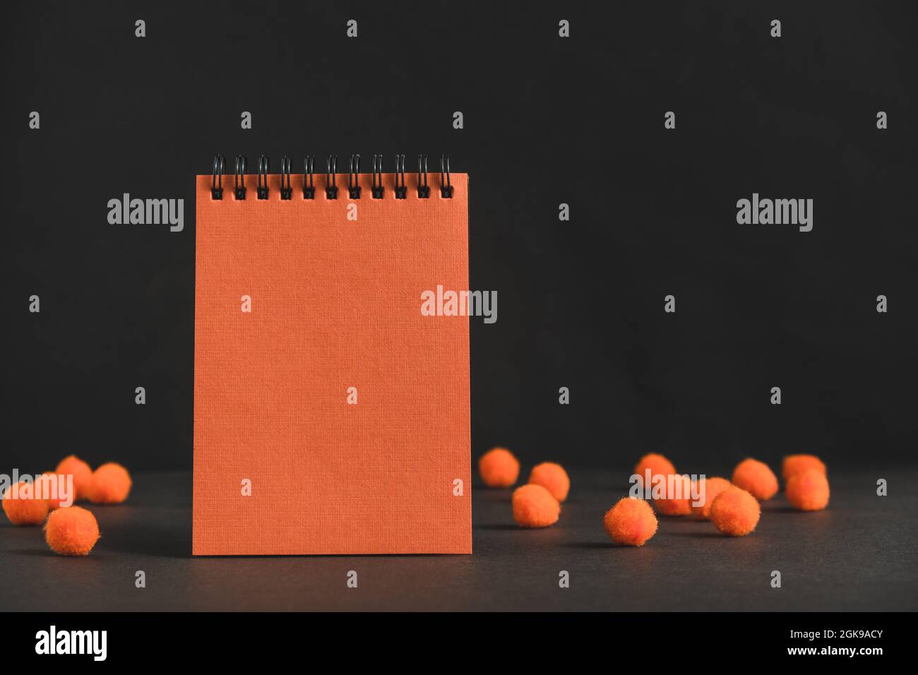 Open notebook page on orange background hi-res stock photography and ...