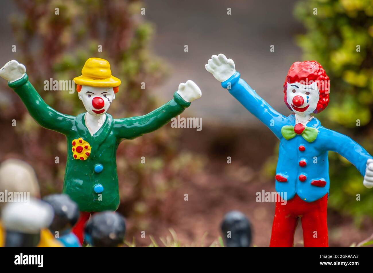 Closeup photo of tiny model clowns in costume Stock Photo - Alamy