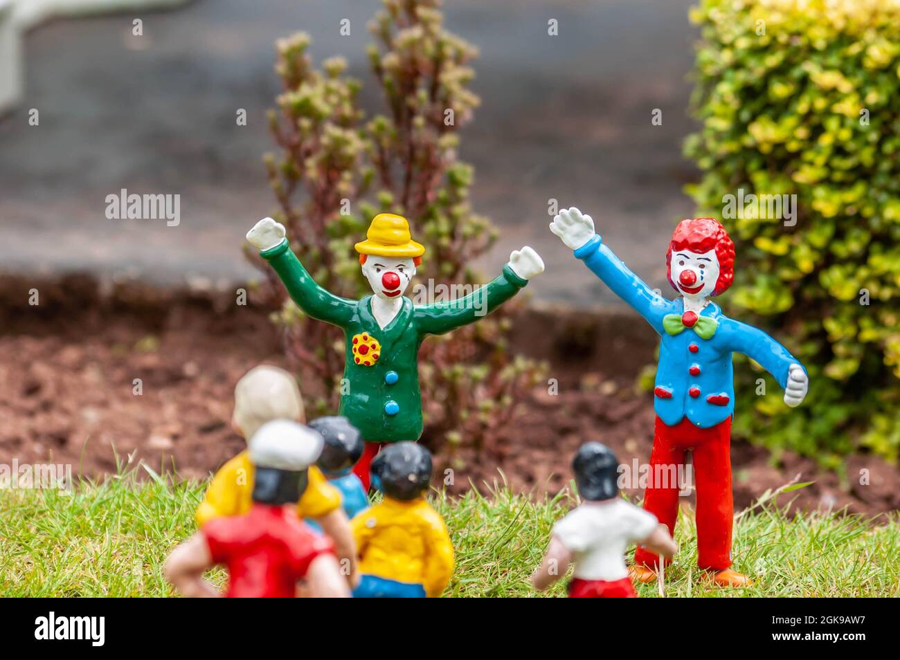Closeup photo of tiny model clowns in costume Stock Photo - Alamy