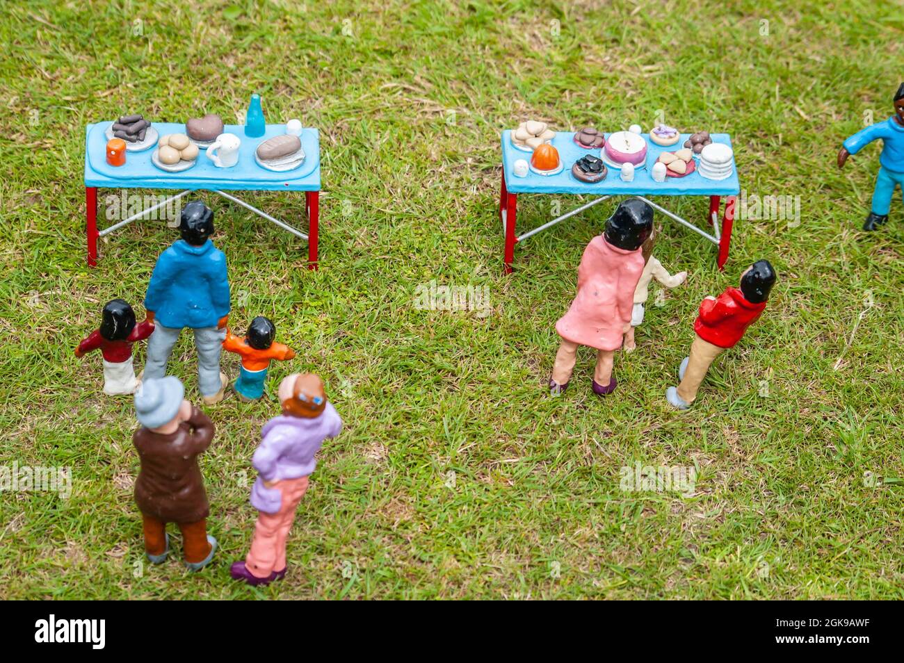 Closeup photo of tiny model figures at a fete Stock Photo - Alamy