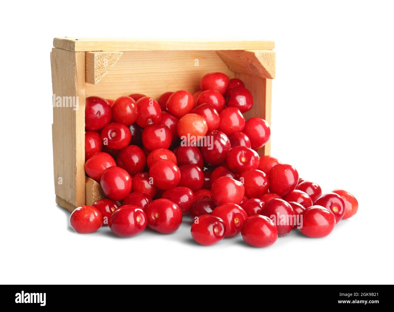 Box with sweet cherries on white background Stock Photo - Alamy