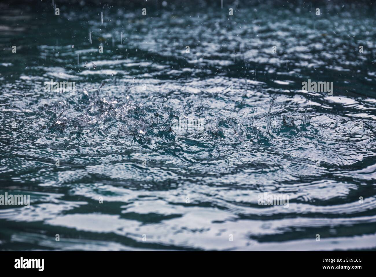 Rain falling on swimming pool hi-res stock photography and images - Alamy