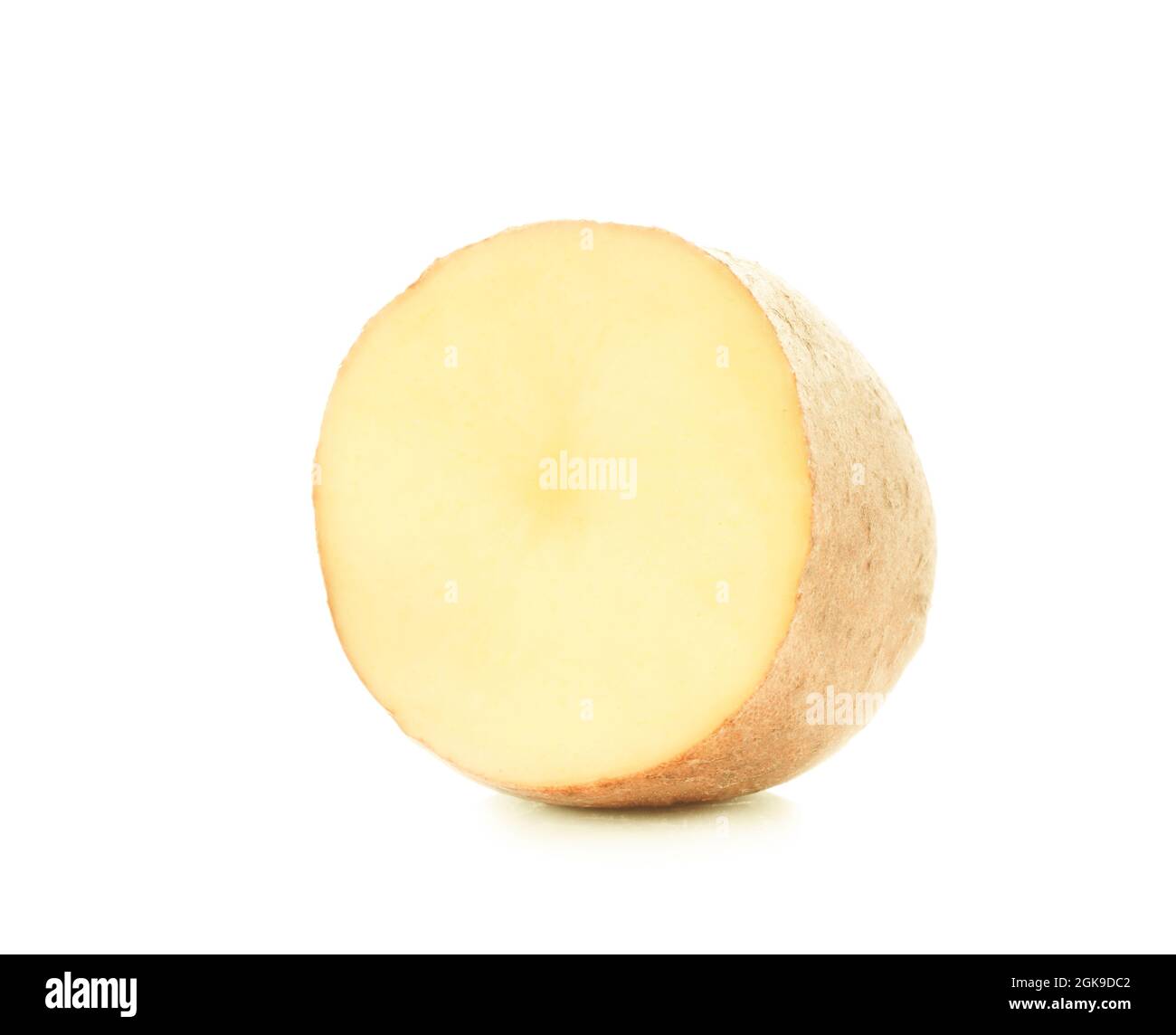 Organic raw potato cut in half on white background Stock Photo - Alamy