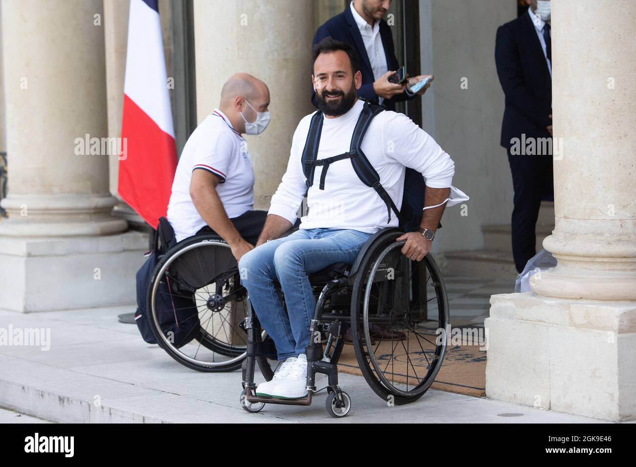 French athlete Michael Jeremiasz arrives prior to the ceremony in honor ...
