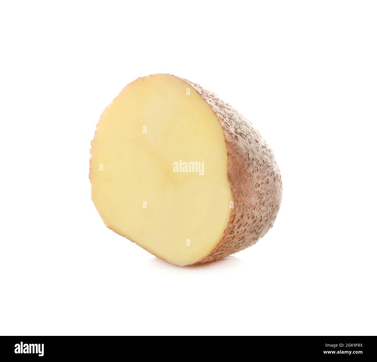 Organic raw potato cut in half on white background Stock Photo - Alamy