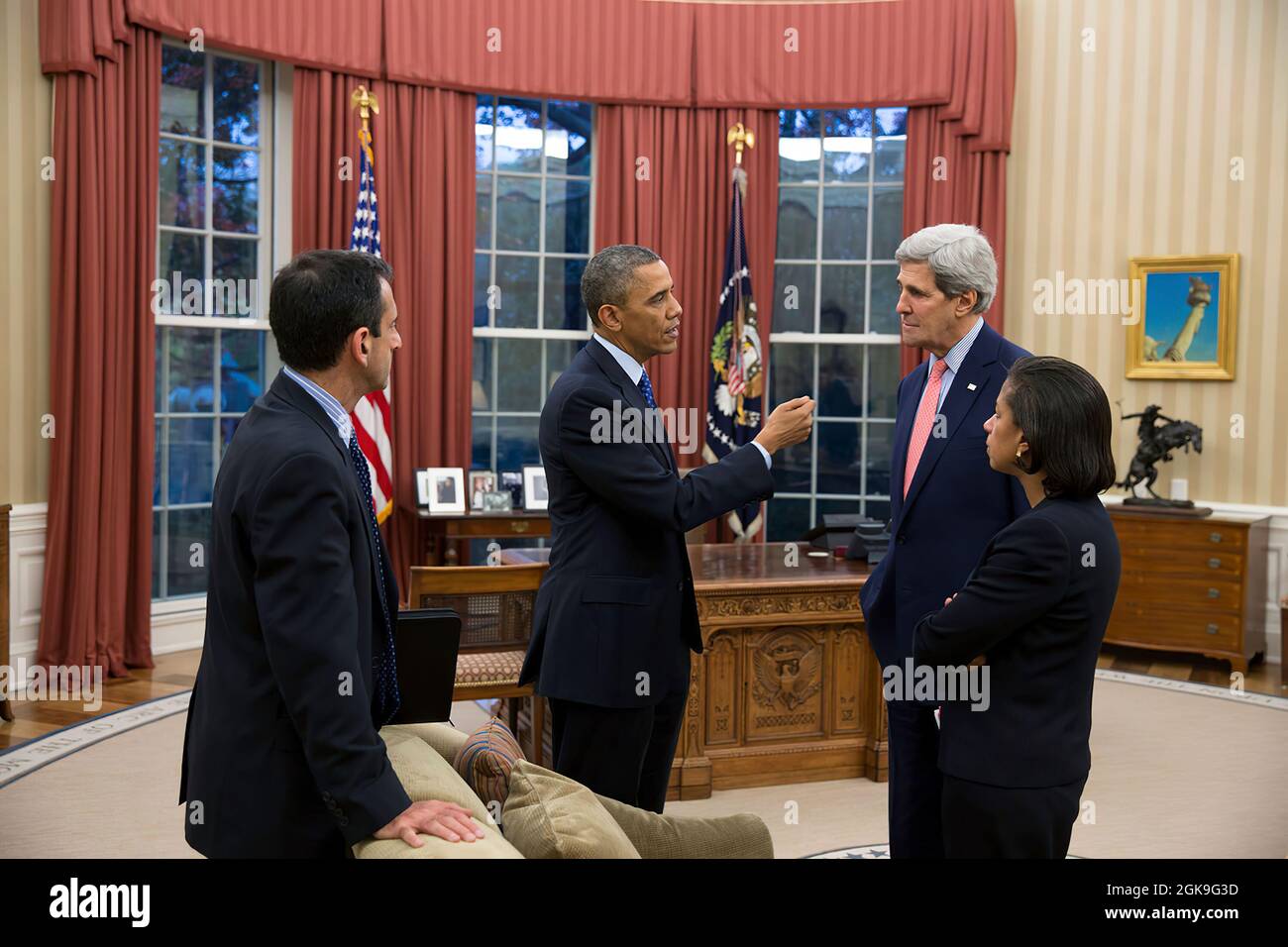 President Barack Obama talks with Secretary of State John Kerry and ...