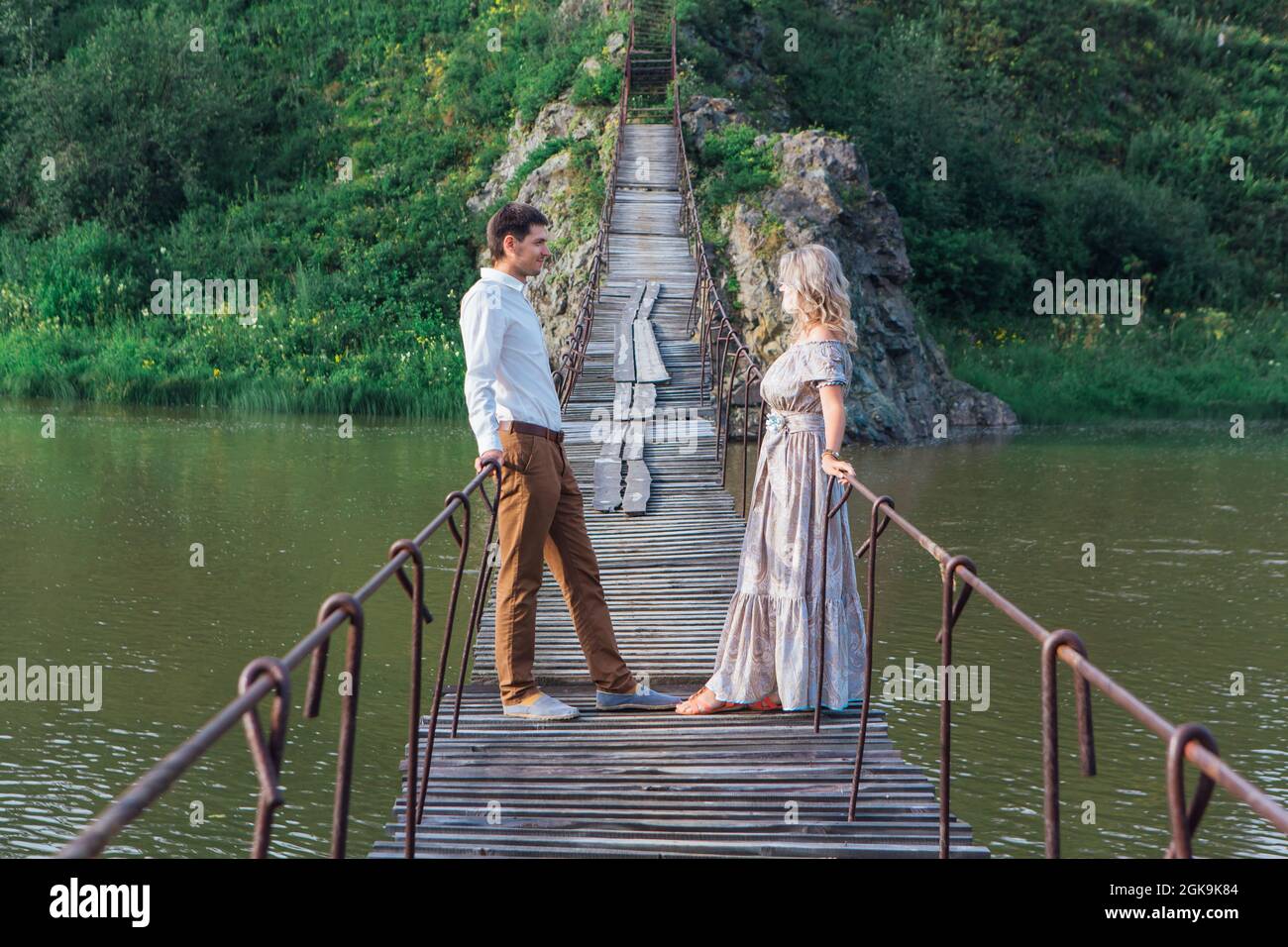 Woman man walking on suspension hi-res stock photography and images - Alamy