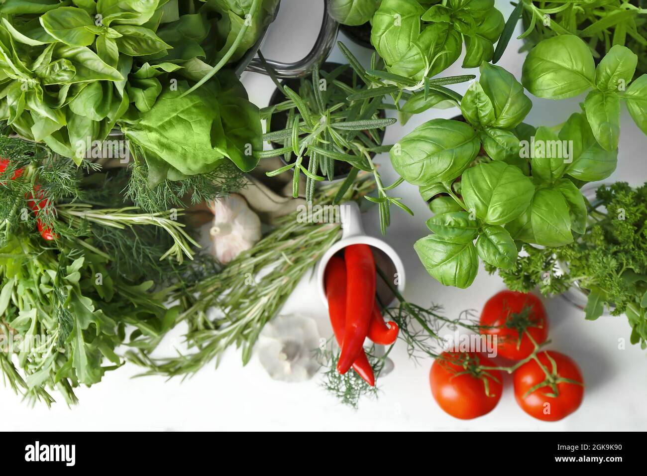 Variety of fresh herbs on white background Stock Photo - Alamy