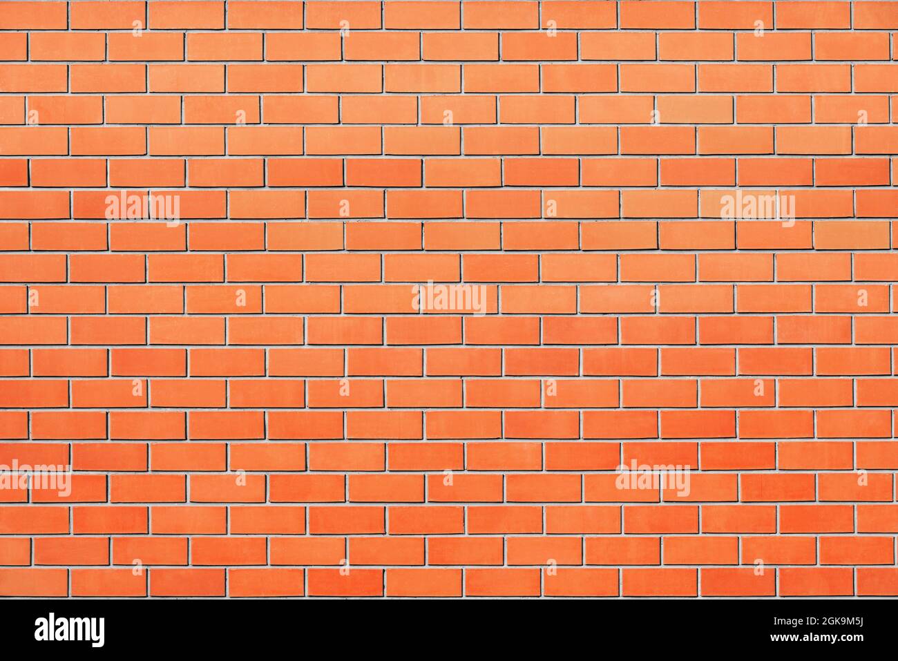 Red brick wall background inside of the room Stock Photo - Alamy