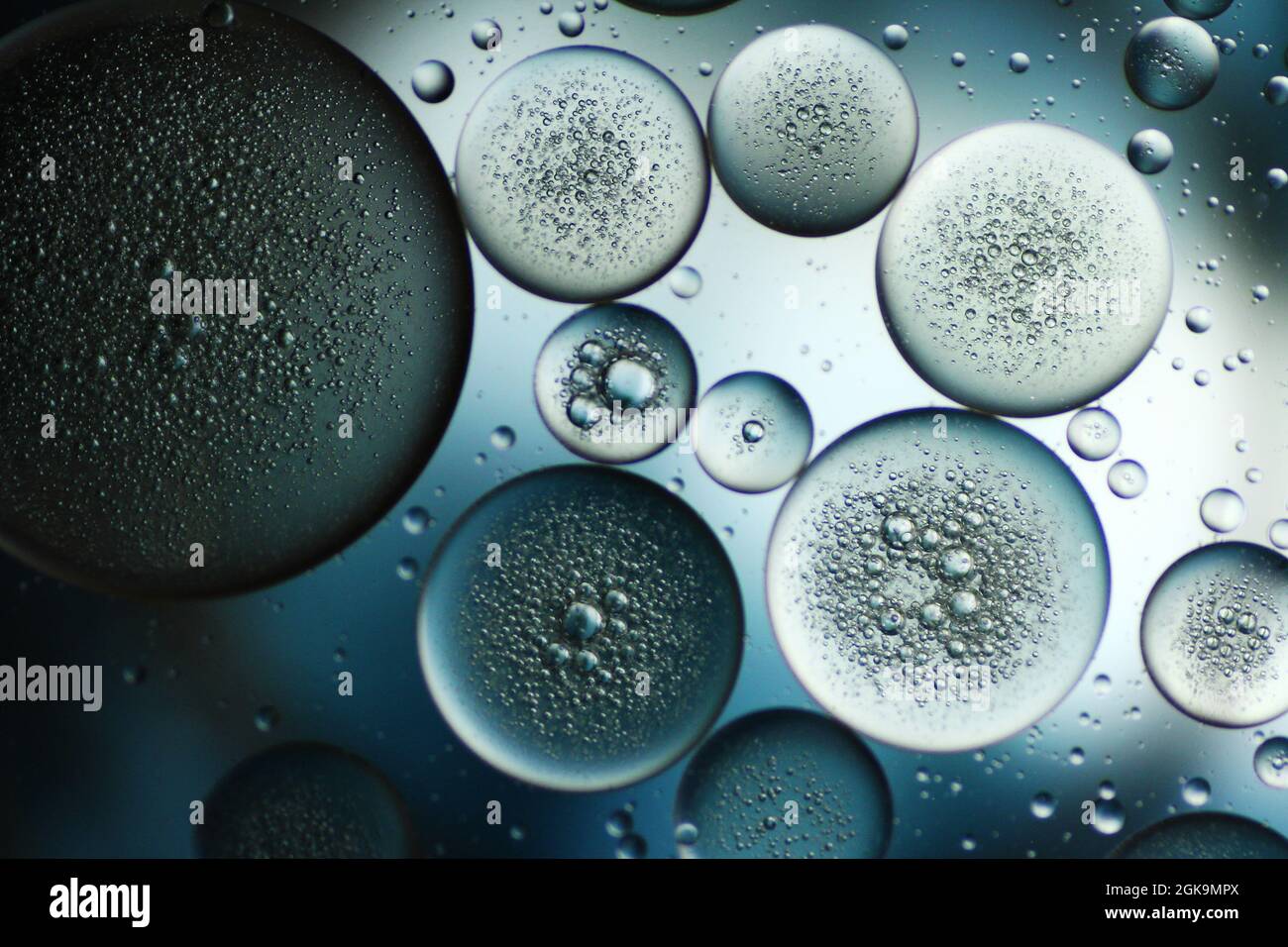Mixture of oil and water background Stock Photo - Alamy