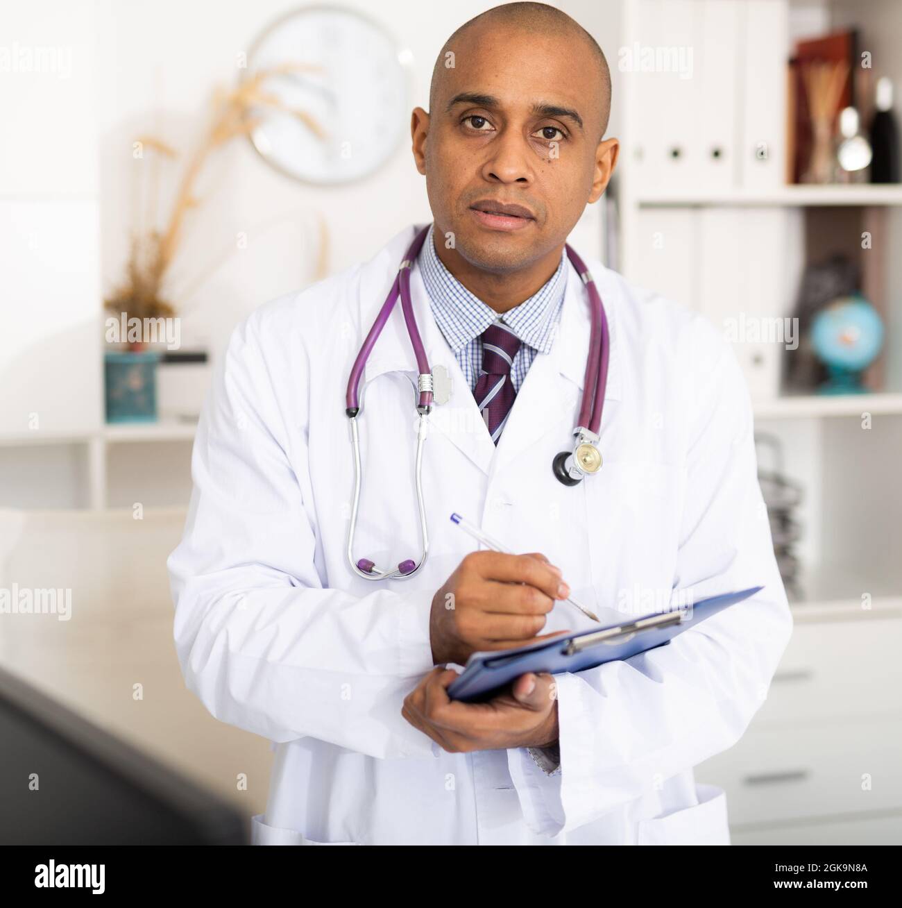Latin american doctor wear white medical uniform, stethoscope and ...