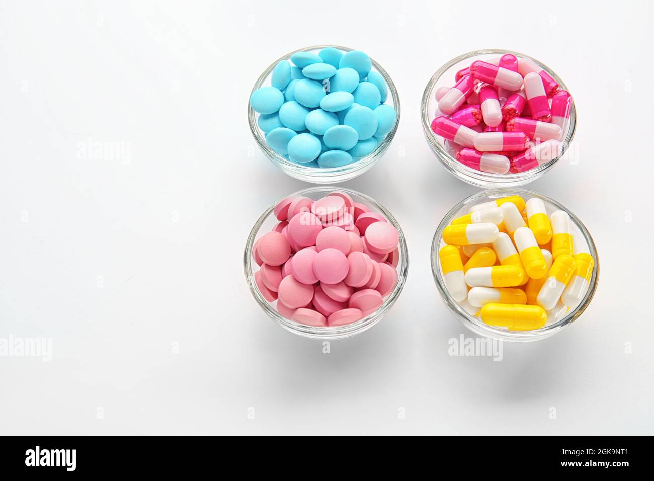 Composition with different colorful pills on white background Stock ...