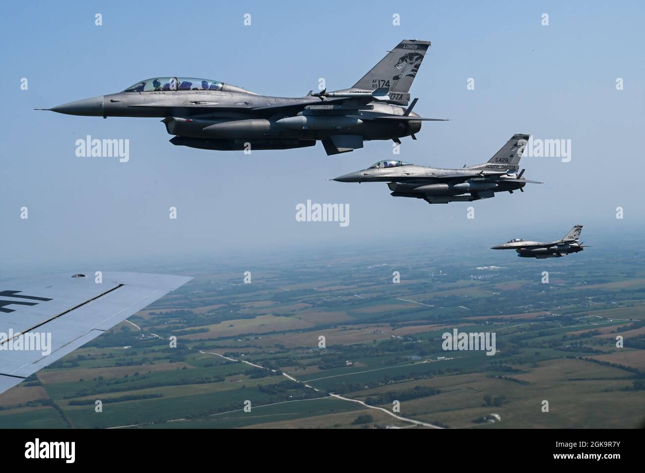F-16s from the 114th Fighter Wing get into formation after a flyover on ...