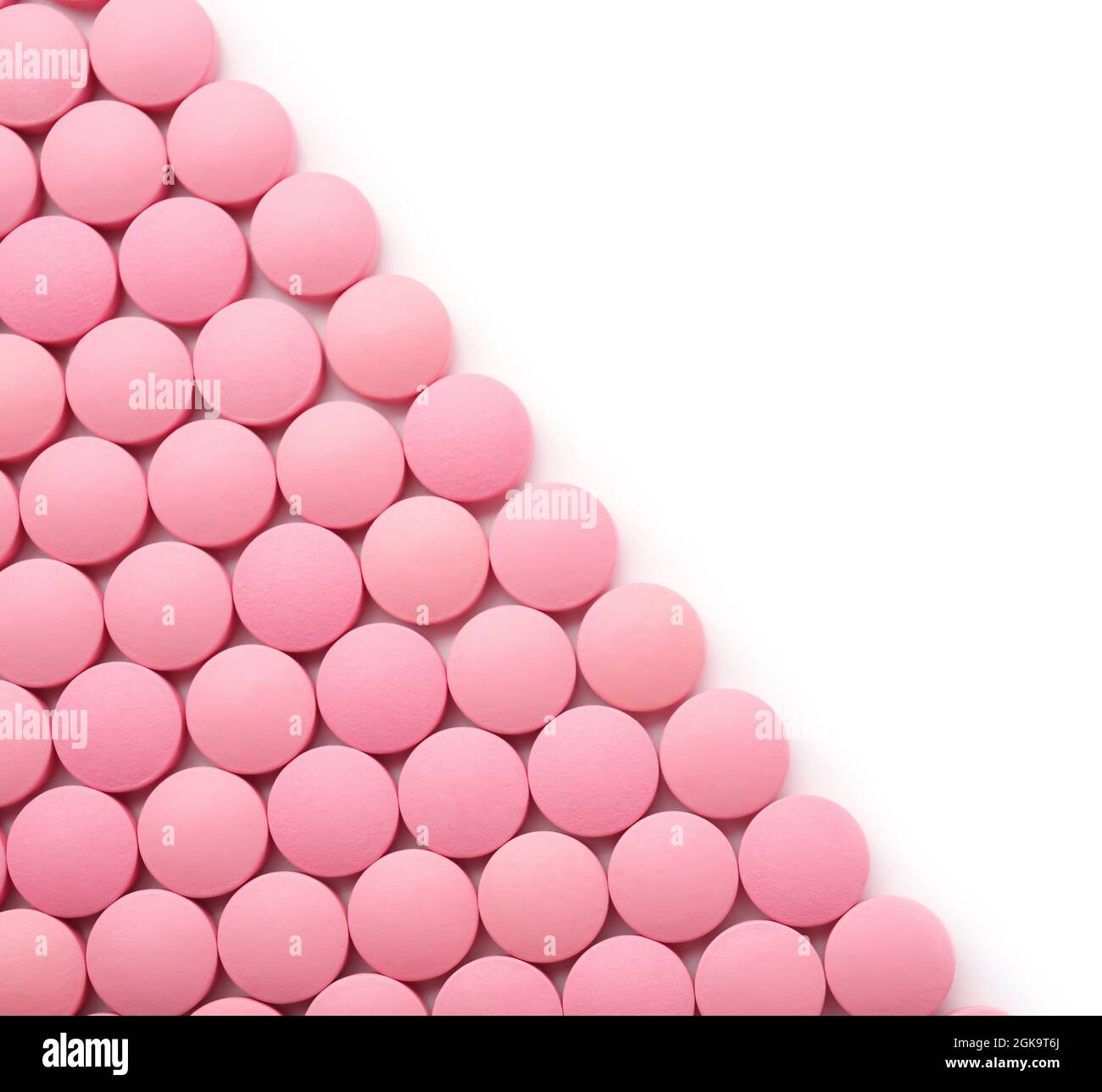 Color round pills on white background Stock Photo - Alamy