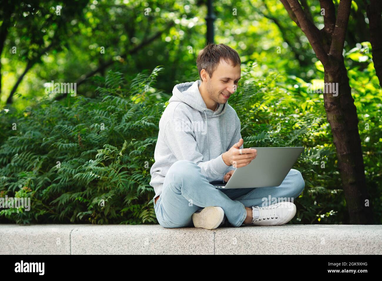 Smiling remote worker read email of salary increase or career ...