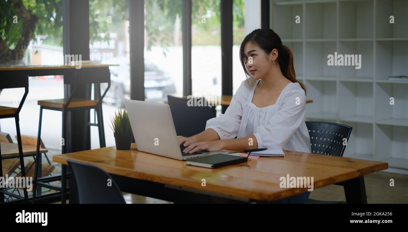 Photo of gorgeous secretary working at office. she sitting at the ...