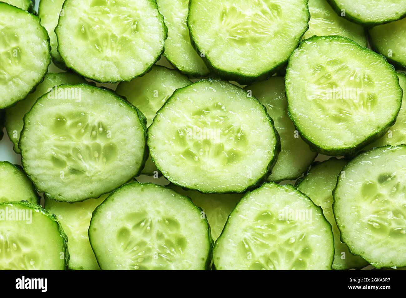 Fresh cucumber slices as background Stock Photo - Alamy