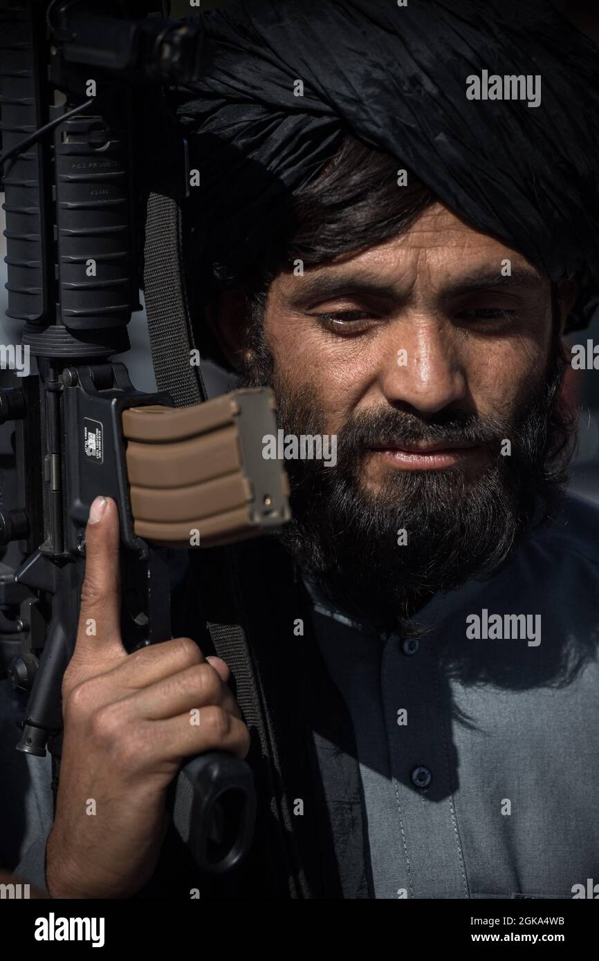 EDITORIAL USE ONLY - Taliban take photos In front of one of the ...