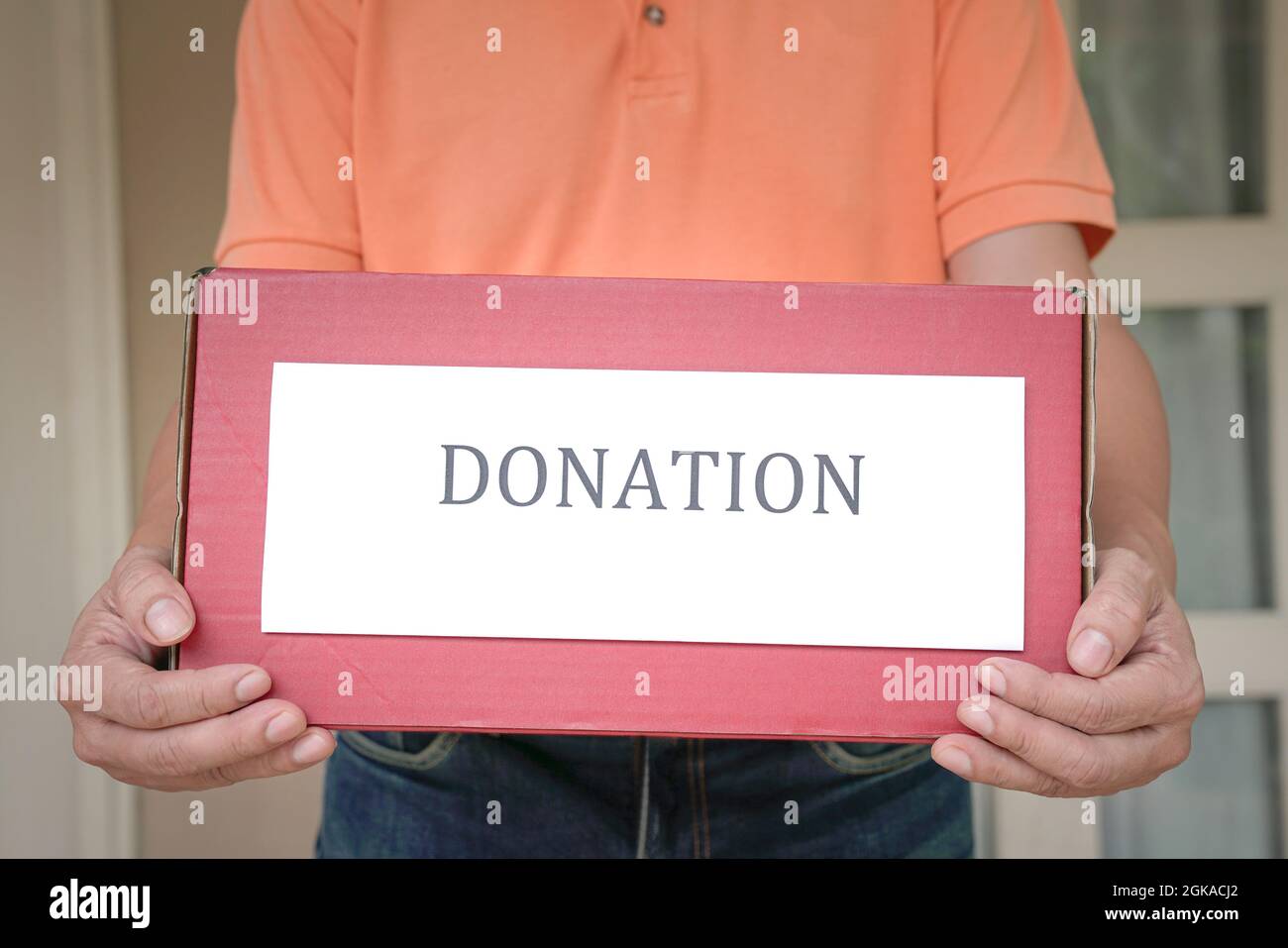 Man giving charity hi-res stock photography and images - Alamy