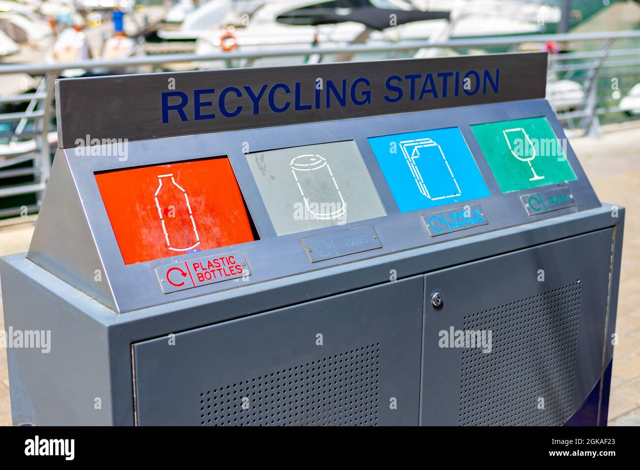 Outdoor public garbage bin with compartments for general and recycling ...