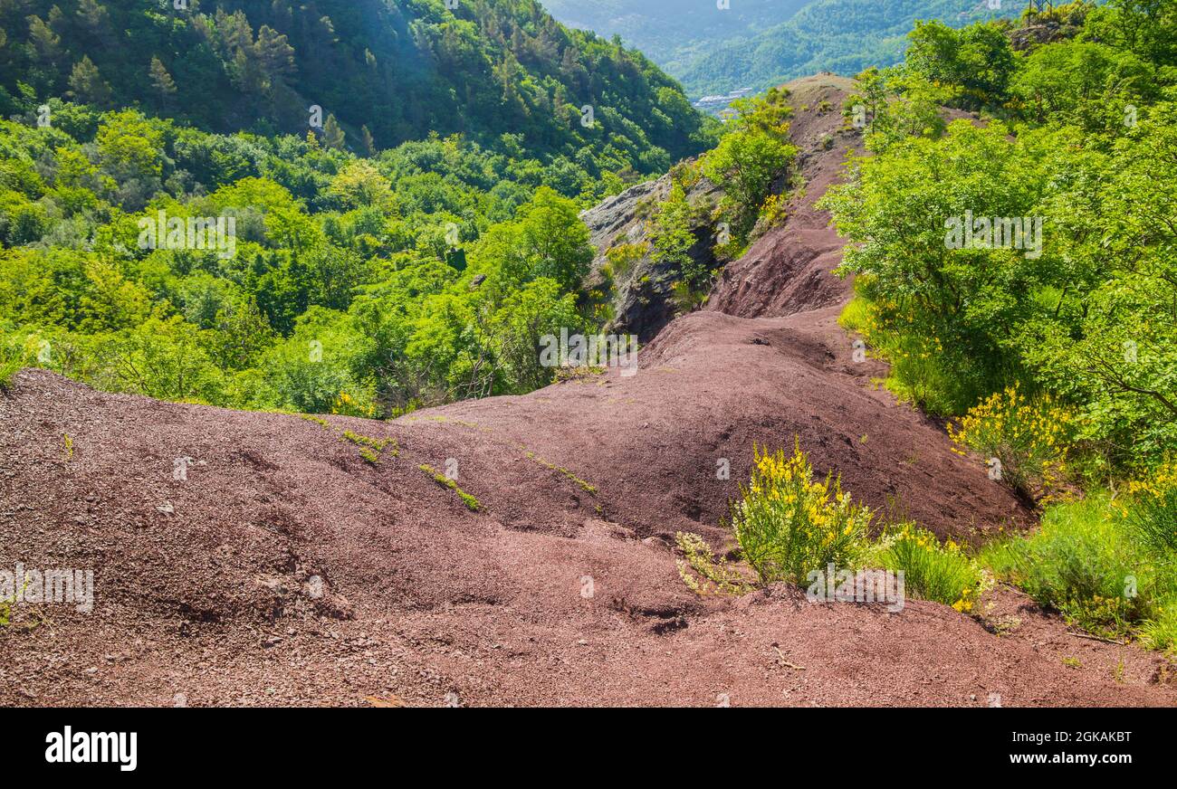 View of the "Terre Rosse" (Red Lands) a small area made up of rocks and ...