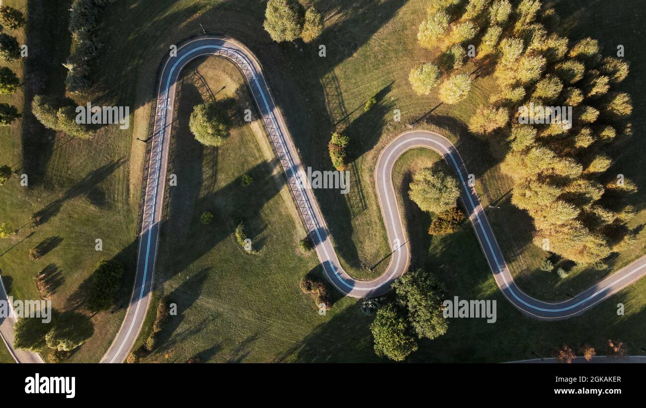 Winding road aerial view bike hi-res stock photography and images - Alamy