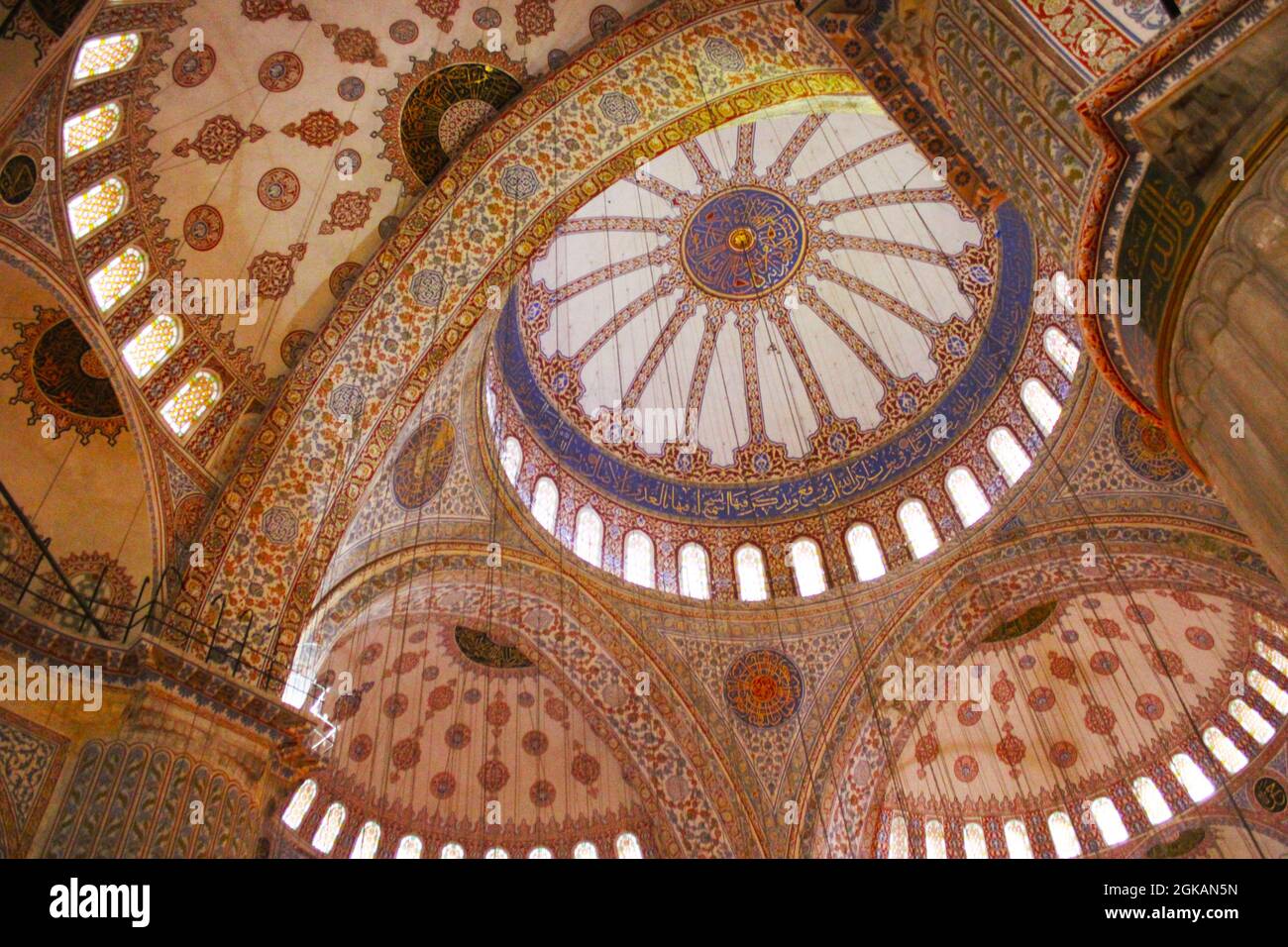 Low angle shot of a ceiling of the Blue Mosque with hand-painted blue ...