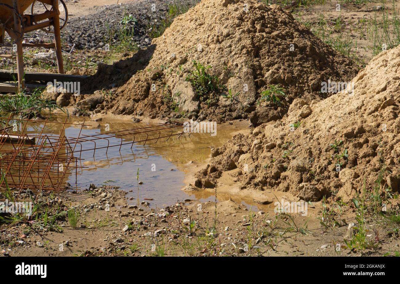 construction material theme like iron construction fence or sand mounds ...