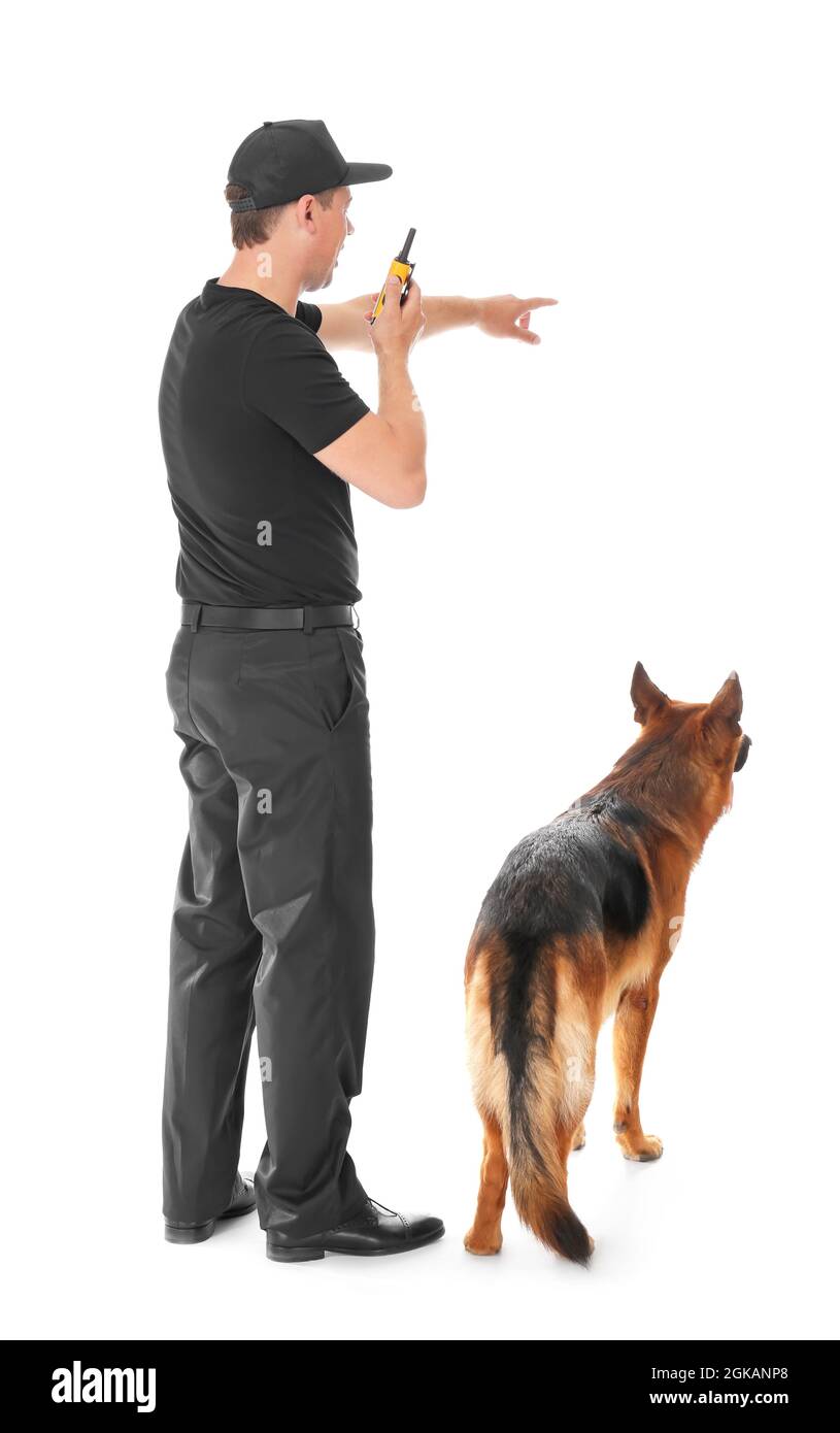Security guard with dog on white background Stock Photo - Alamy