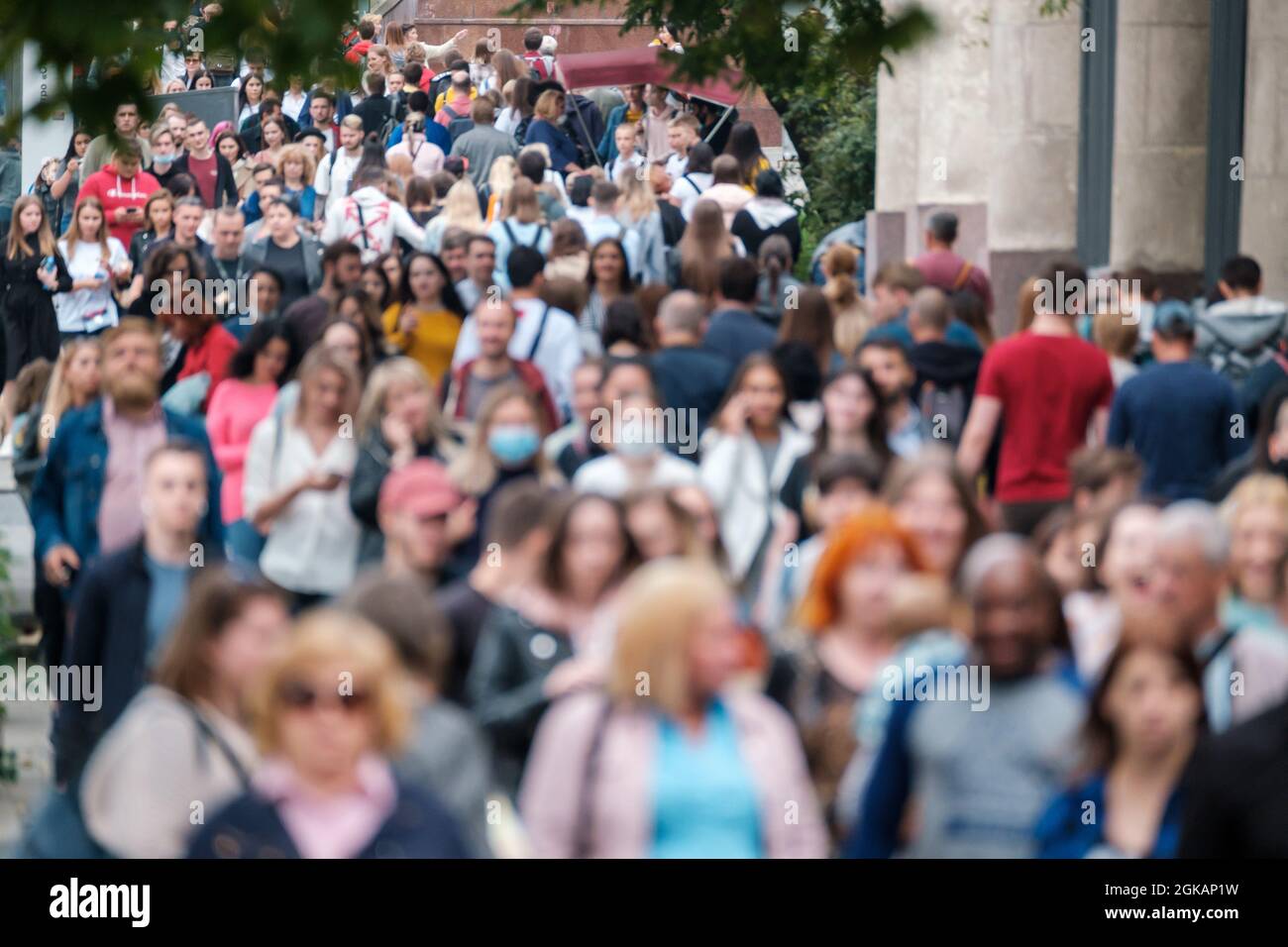 Crowd of unrecognizable people walking along street Stock Photo - Alamy