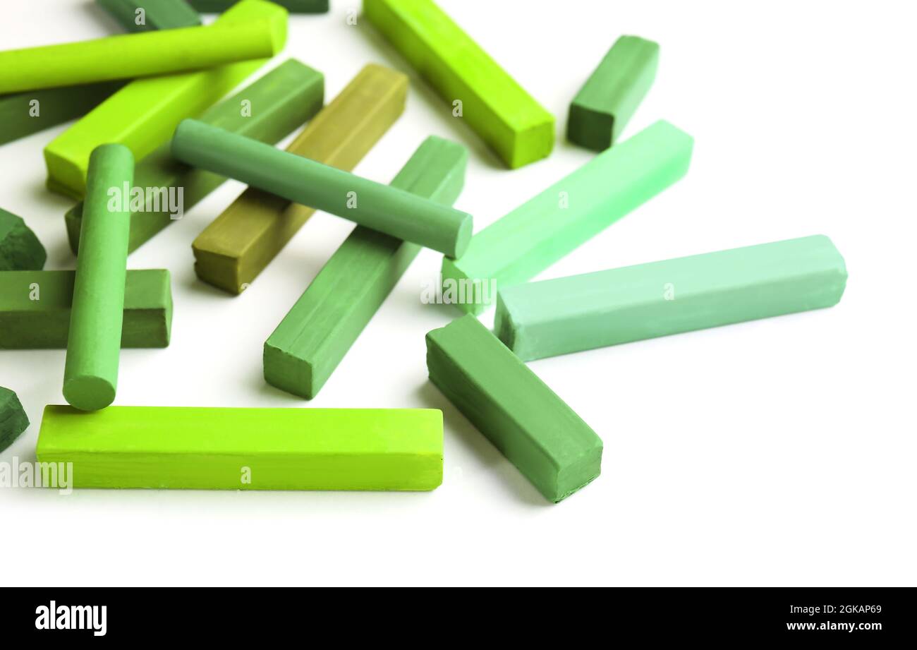 Bright green chalk on white background Stock Photo - Alamy